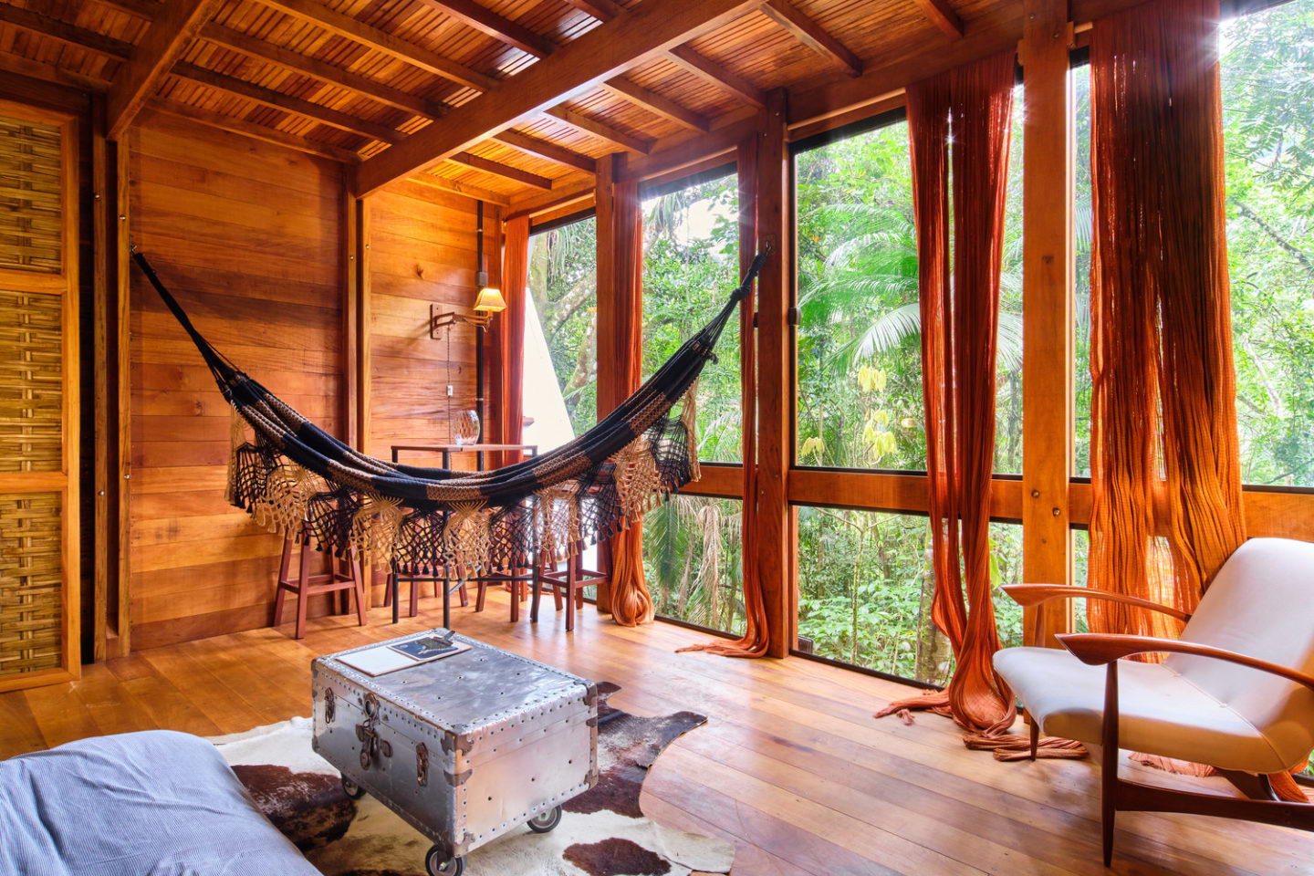 A monkey house in between trees - What Design Can Do